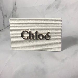 Chloe | Accessories | New Chloe Store Display Sign Stand Stone Gold ...